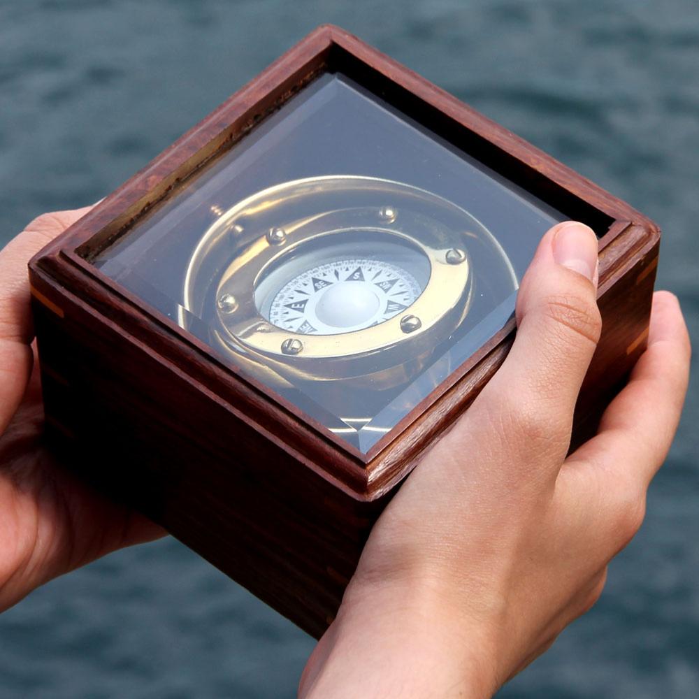 Ship’s Compass, brass in wooden box,11x11x7cm